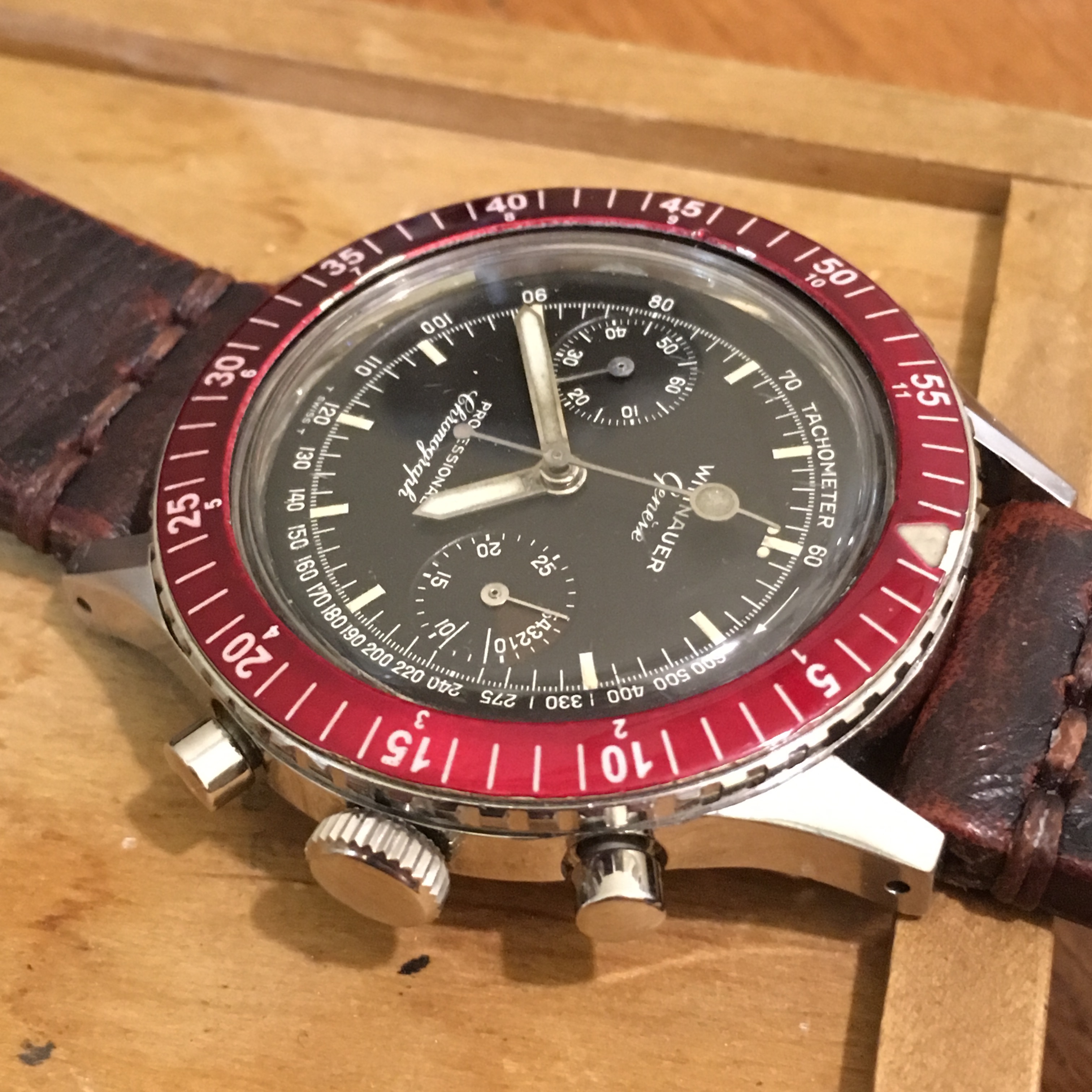 Vintage Wittnauer chronograph watch with red rotating bezel